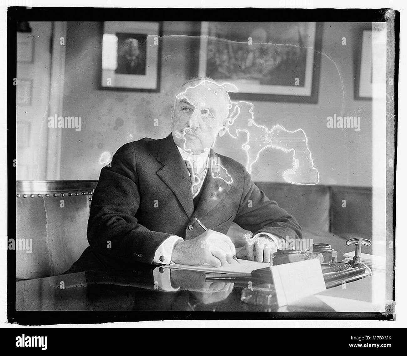 A portrait of Admiral Benson at his desk, illustrating his role in the ...
