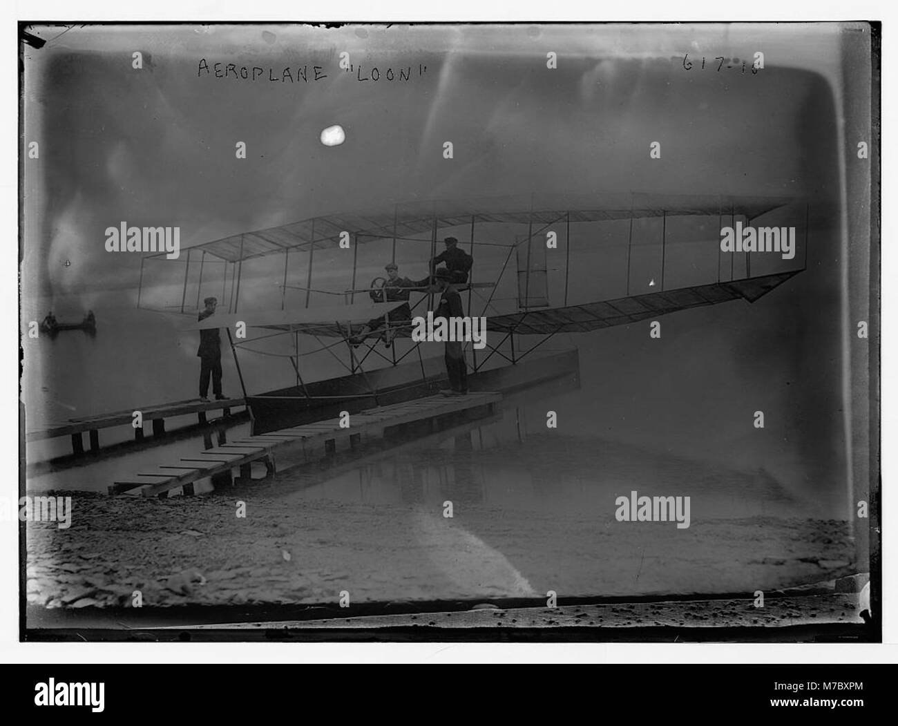 An image of the 'Loon' aeroplane at a pier, showcasing early 20th ...