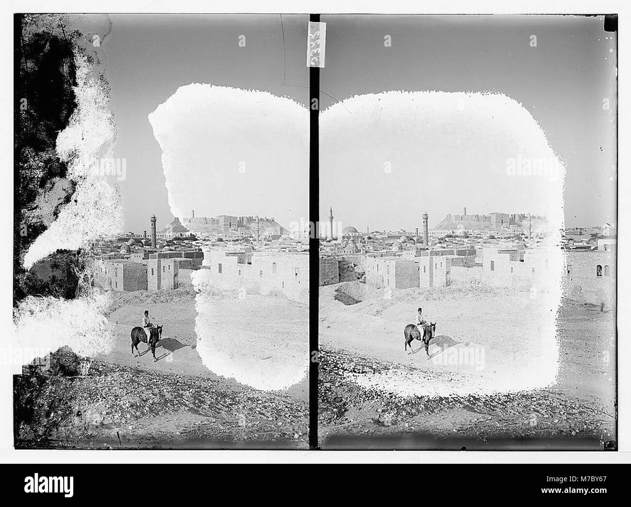 This image shows the ancient city of Aleppo (Haleb) and its castle from ...