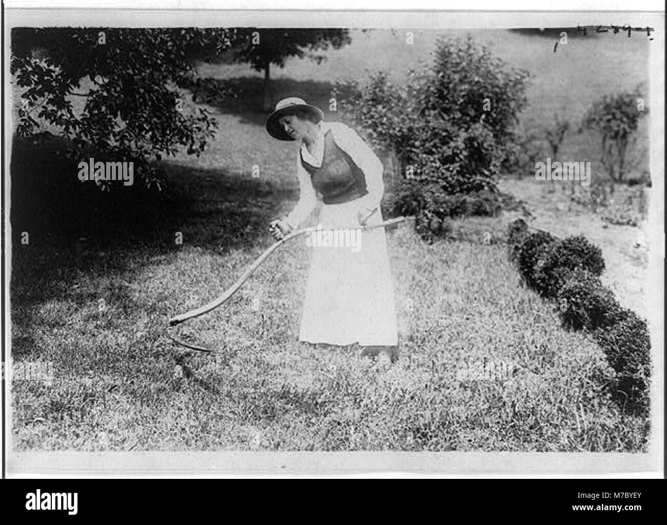 Figure with scythe Black and White Stock Photos & Images - Alamy
