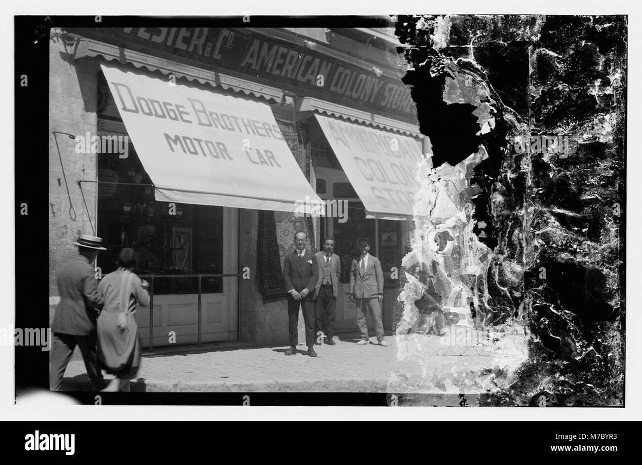 A photograph of the American Colony store front, featuring an awning ...