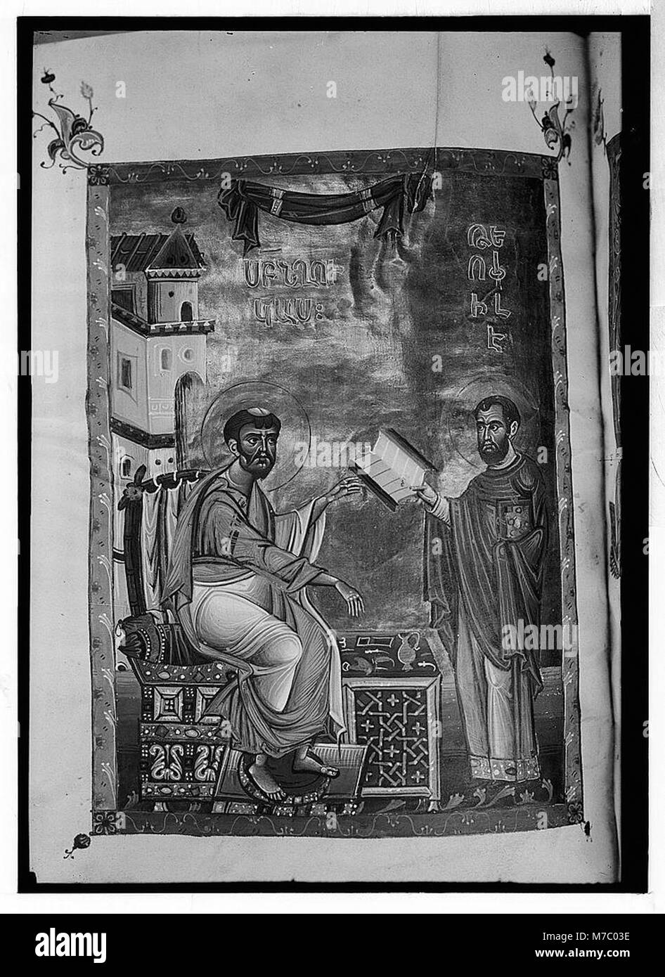 A display of ancient manuscripts, featuring illuminated text and ...