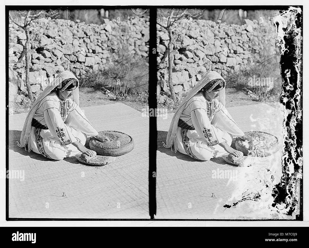 A photograph depicting Arab women working at a traditional, primitive ...