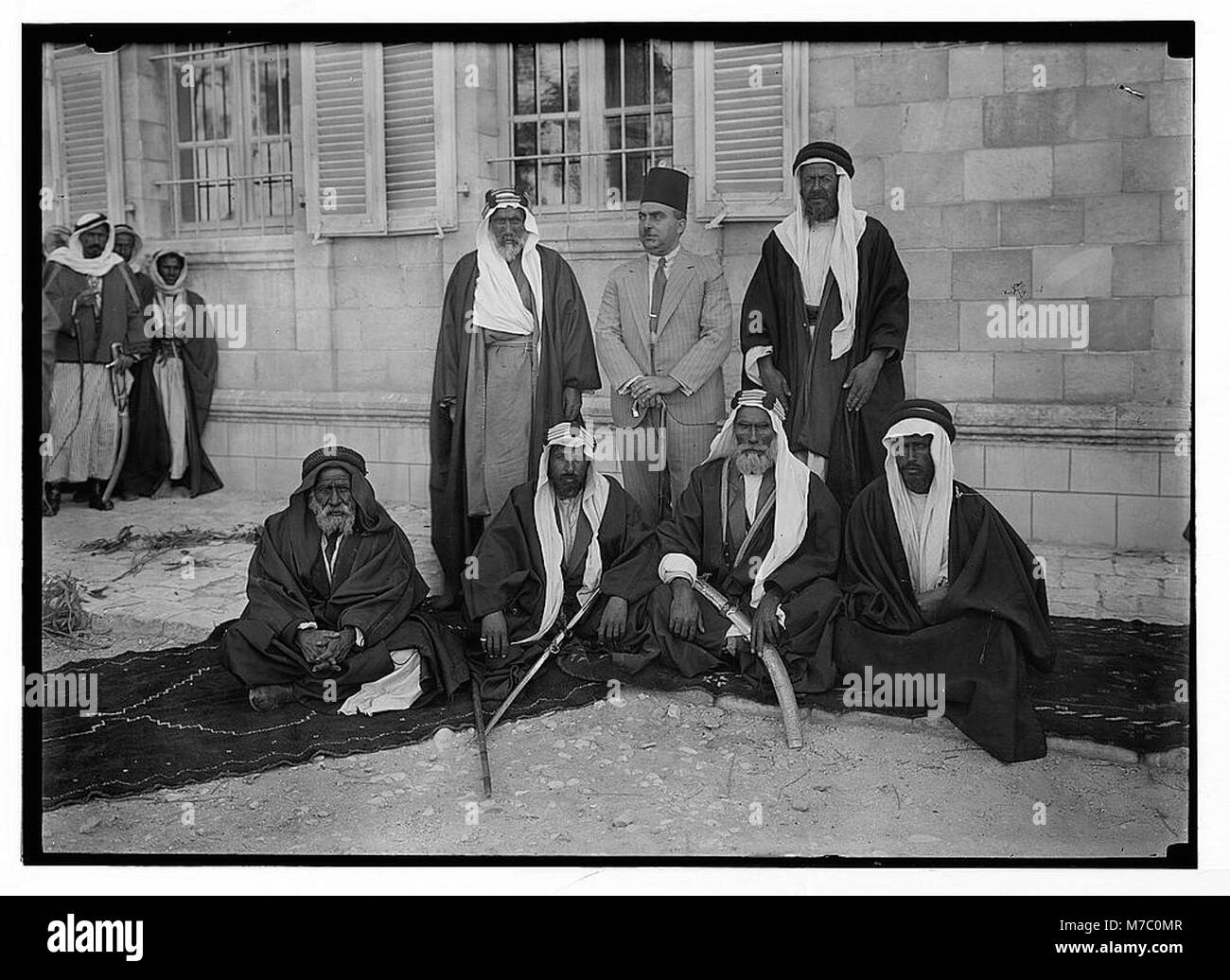 Aref el Aref, alongside Bedouin sheikhs, is depicted in this historical ...