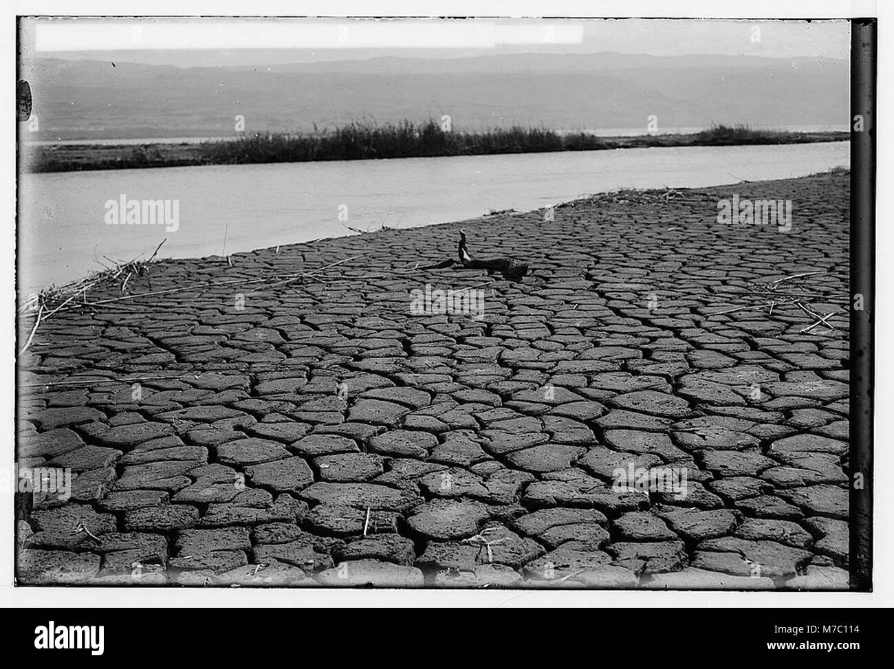 A photograph showcasing the unique dry mud formations at the mouth of ...