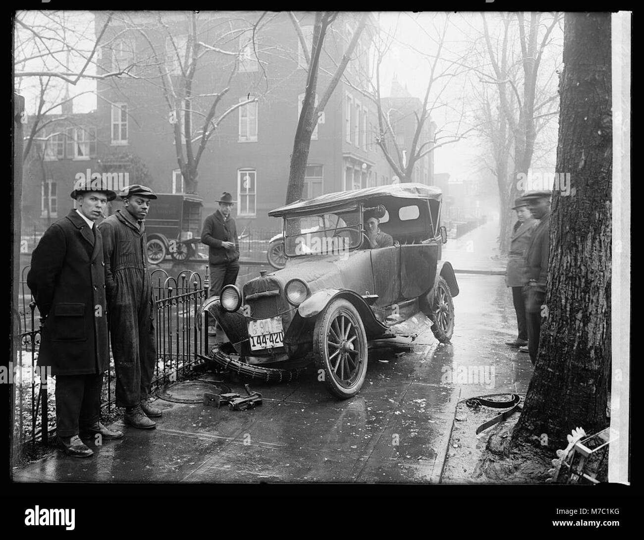Photograph documenting an automobile wreck, showcasing the aftermath of ...
