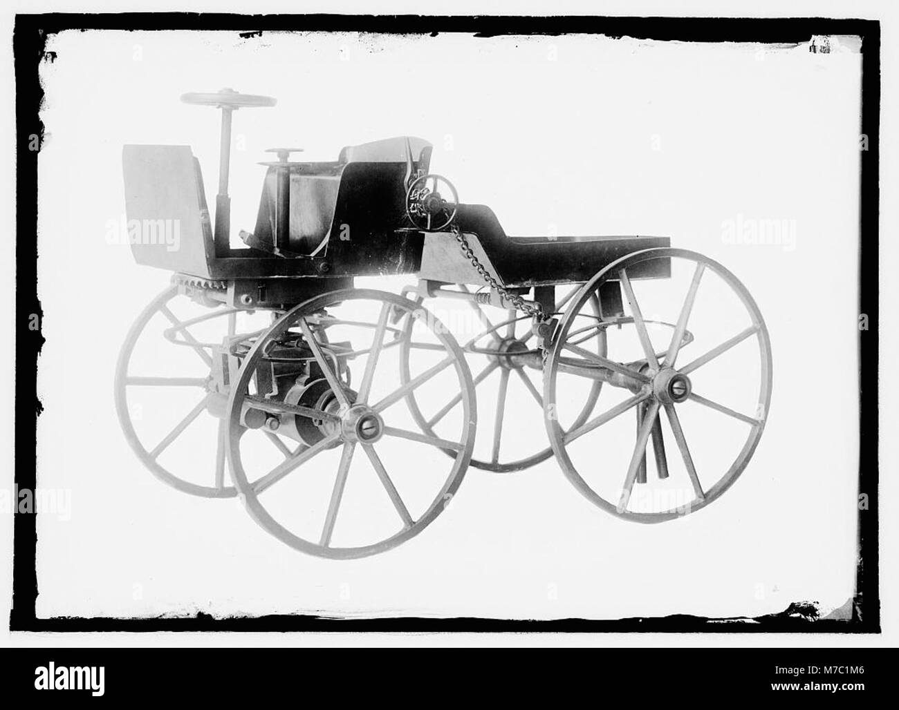 A photograph of an early 20th-century automobile model, showcasing the ...