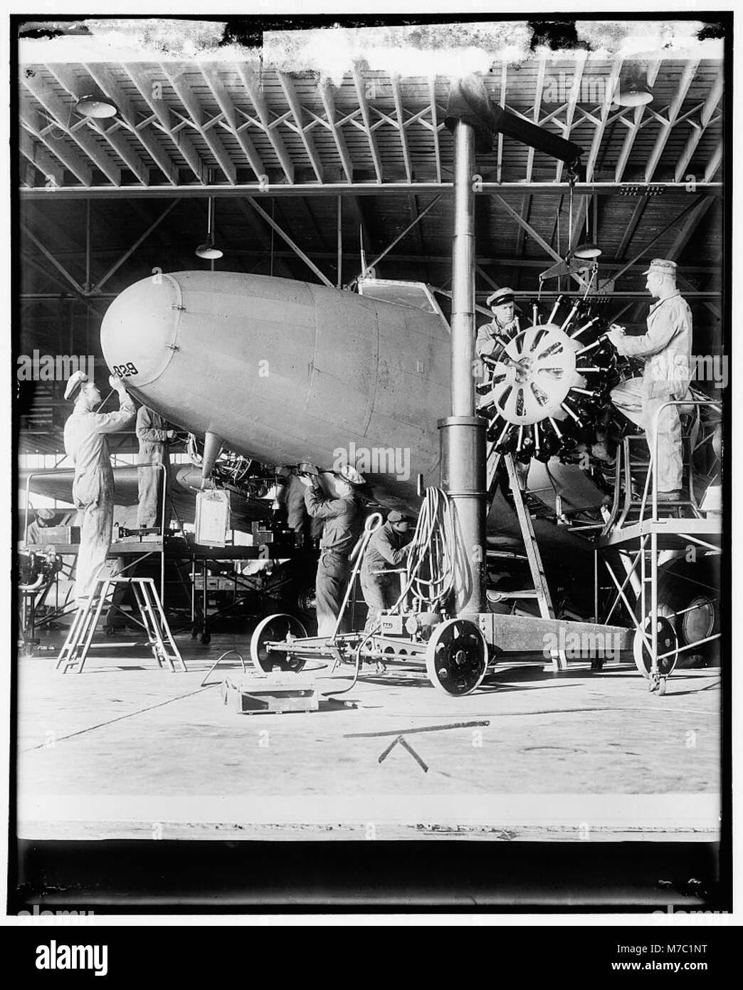 This image showcases early commercial aviation, capturing a historic ...