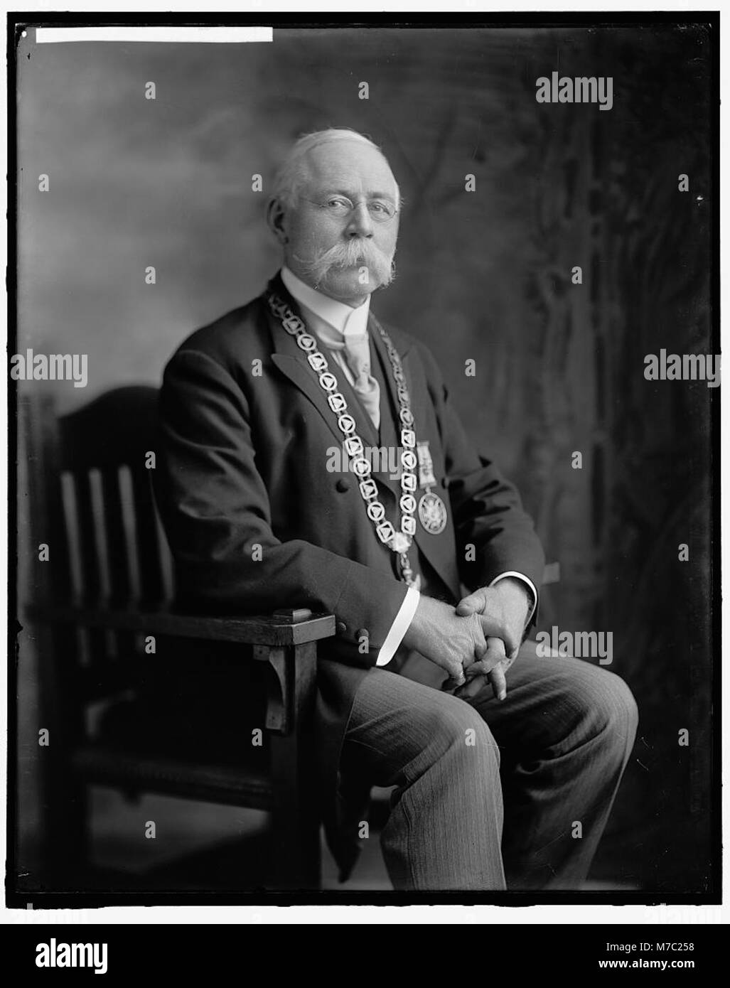 W.H. Ballard, depicted in a formal portrait, was an honorable figure in ...