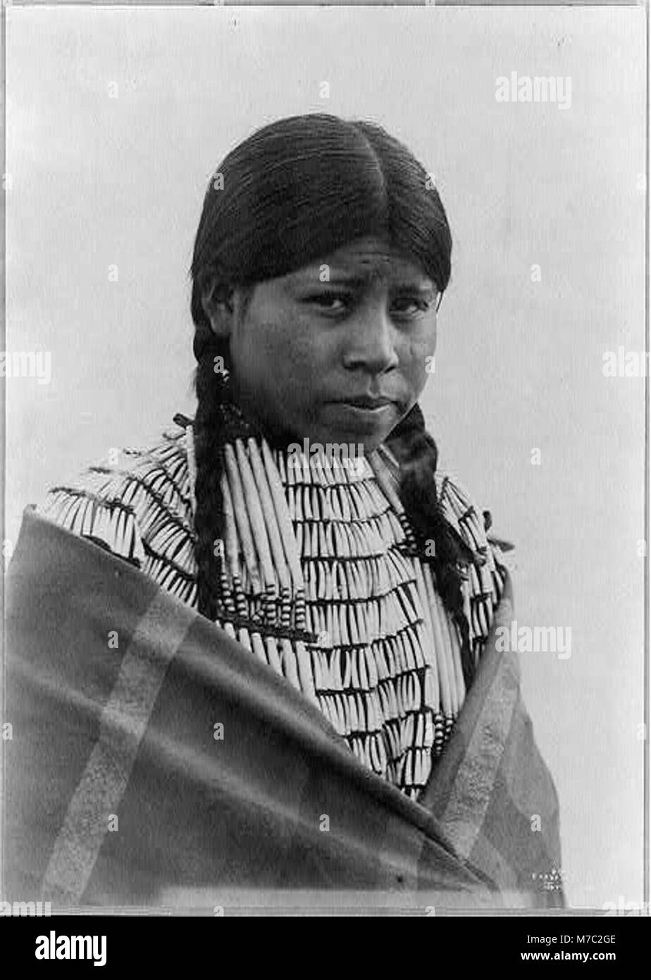 Portrait of a Cheyenne maiden, capturing the traditional clothing and ...
