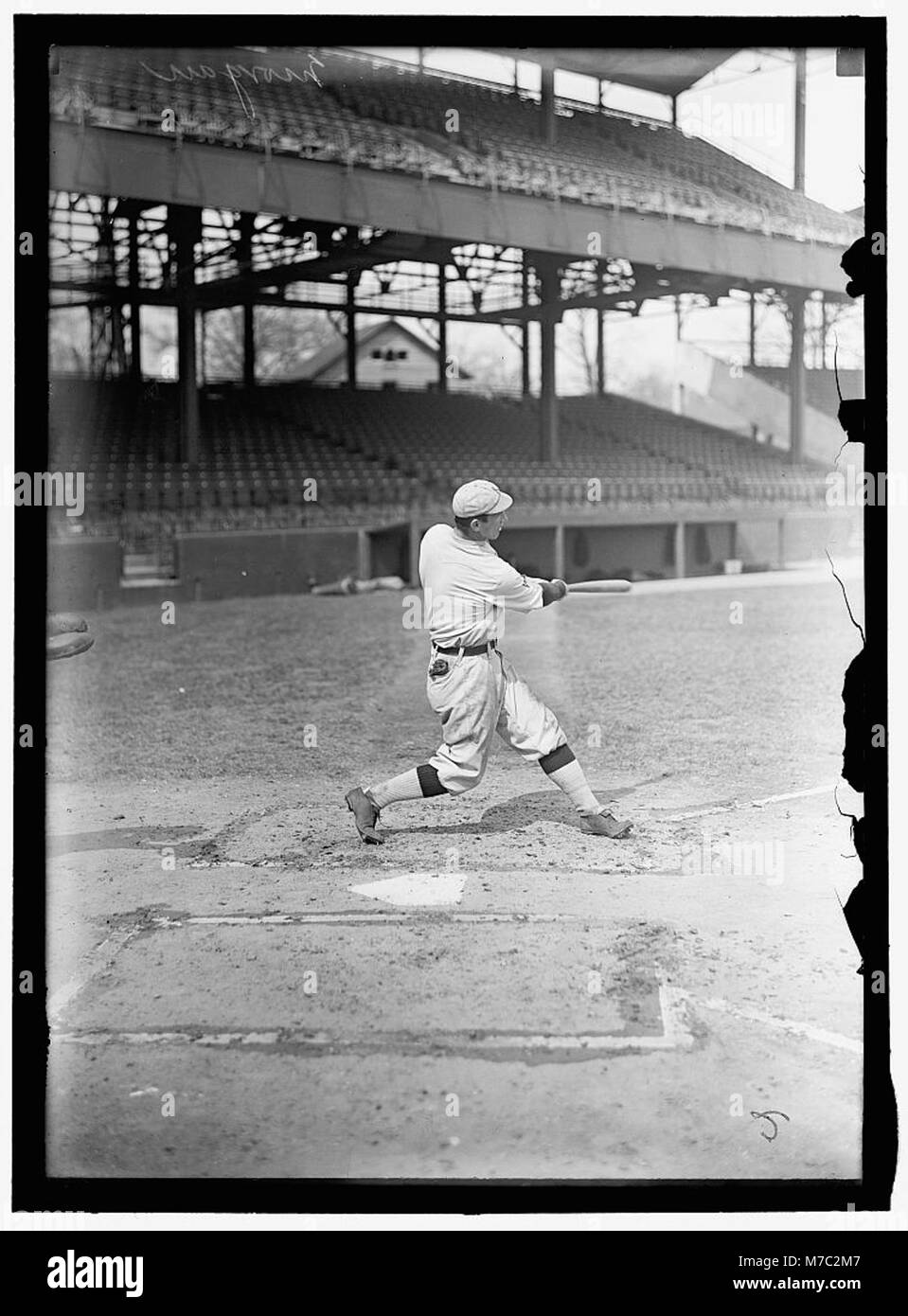 This image depicts professional baseball players in action, showcasing ...