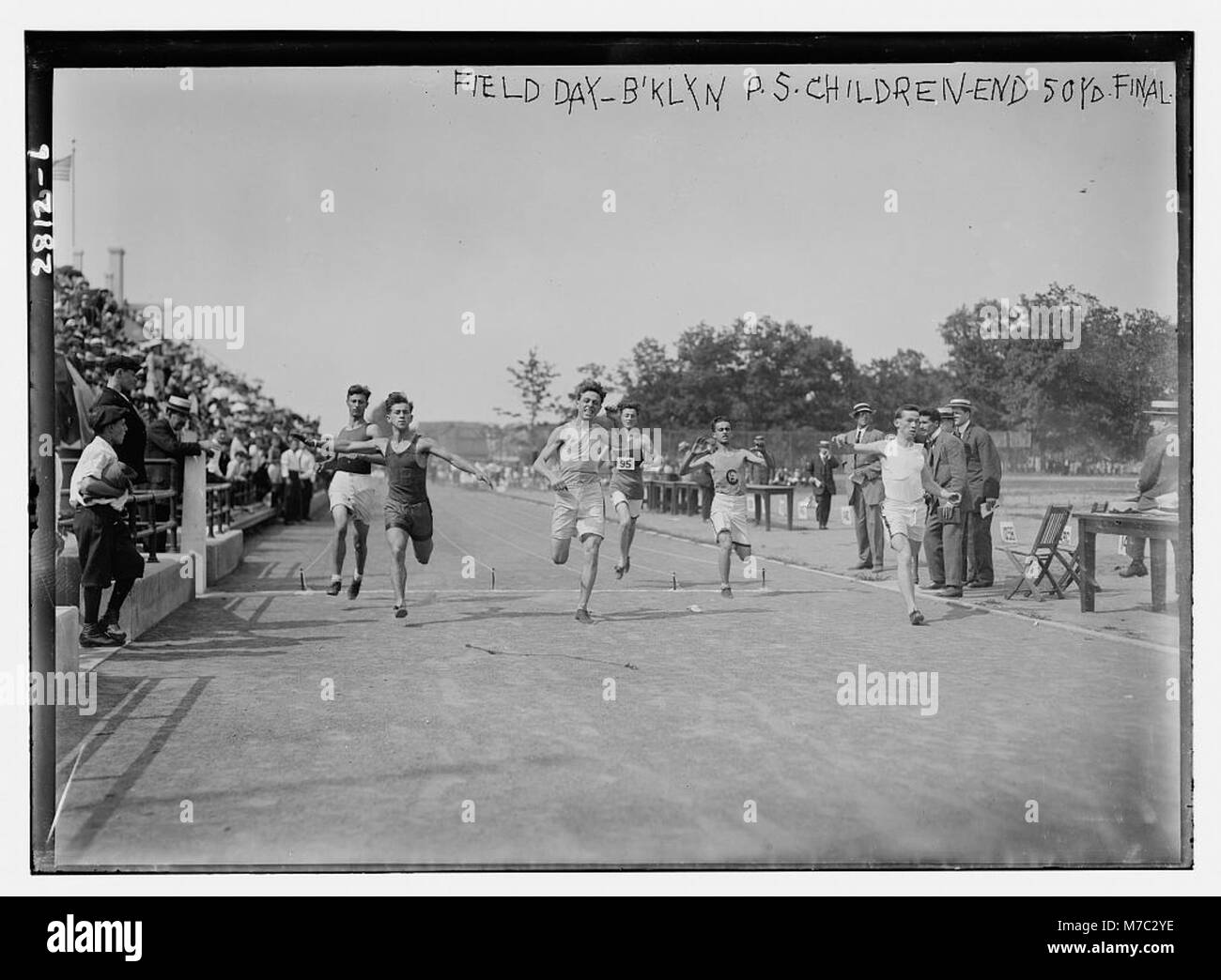 A moment from the 50-yard dash final during a children's field day ...