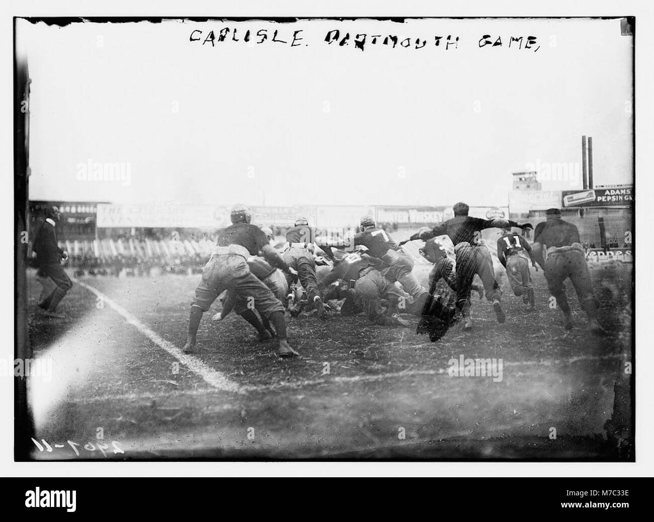 This image depicts a historic football game between Carlisle and ...