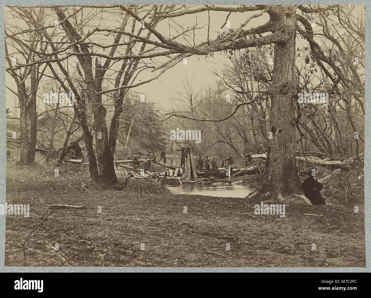A photograph showing the ruins of a railroad bridge at Blackburn's Ford ...