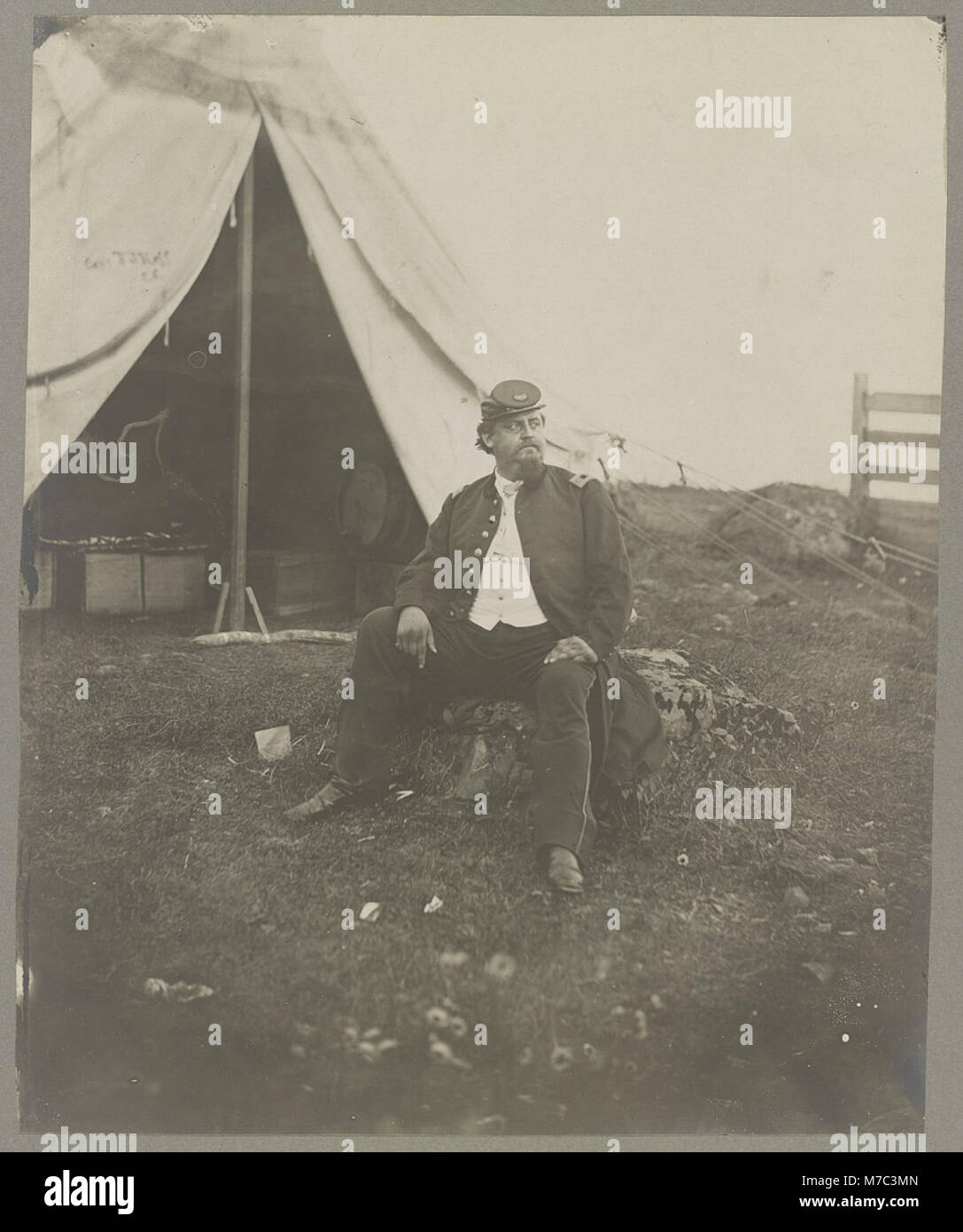 This photograph features Captain John J. Huff, a military officer whose ...