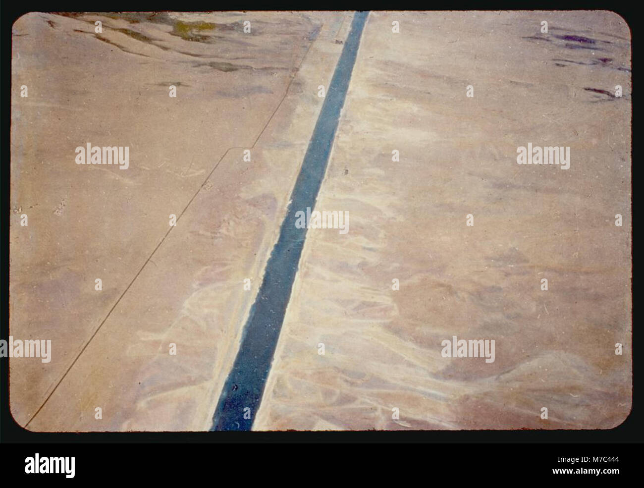 An aerial view of the Suez Canal in Egypt, showcasing its strategic ...