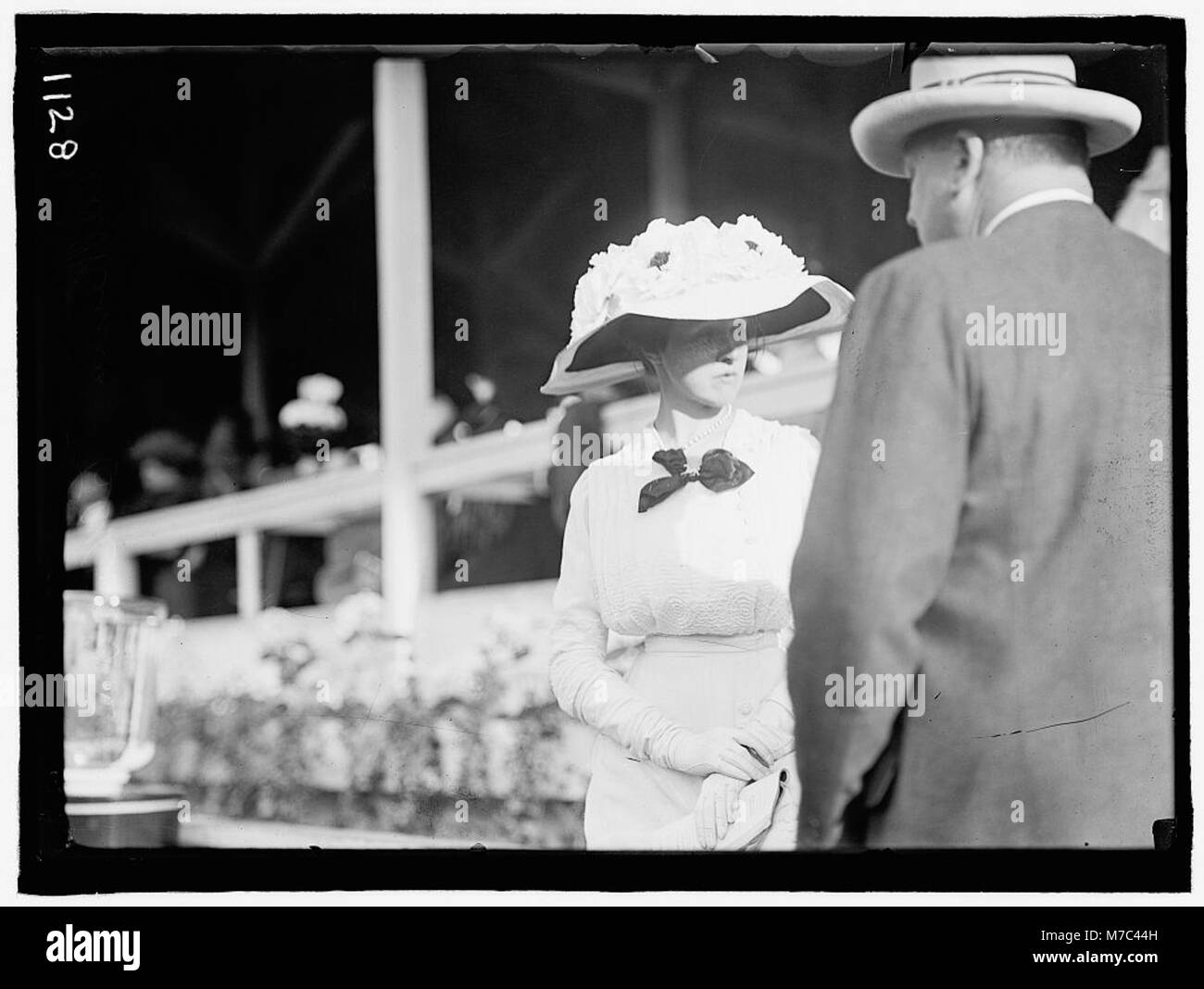 A photograph of Katharine Elkins and Mrs. William F. Hitt at a horse ...