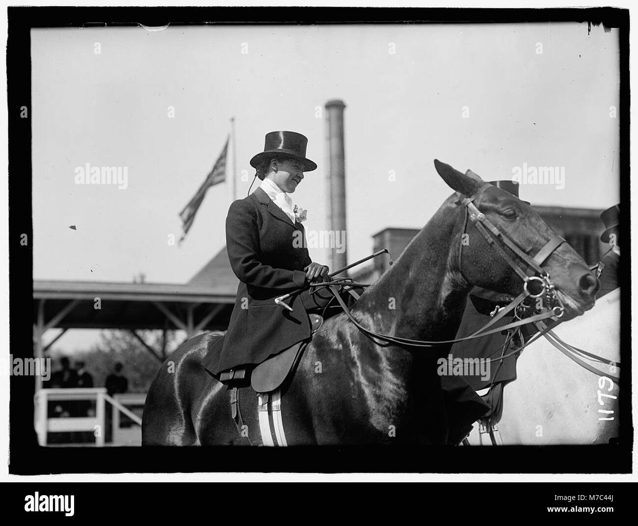 Katharine Elkins and Mrs. William F. Hitt attending a horse show. The ...