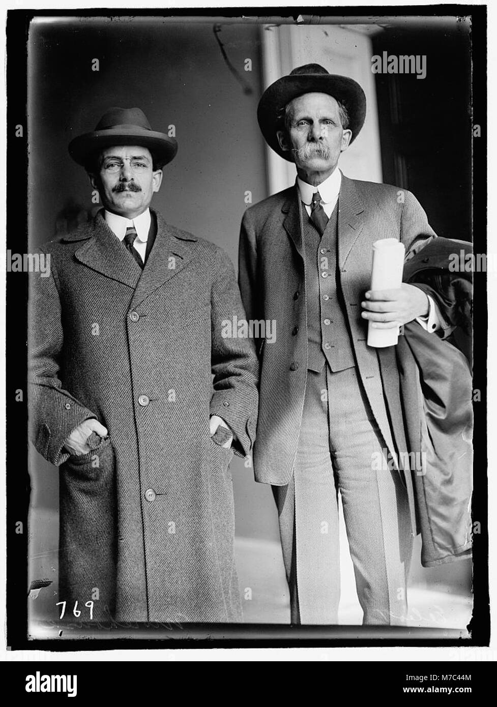 A photograph featuring C.G. Elliott on the right, alongside A.D ...