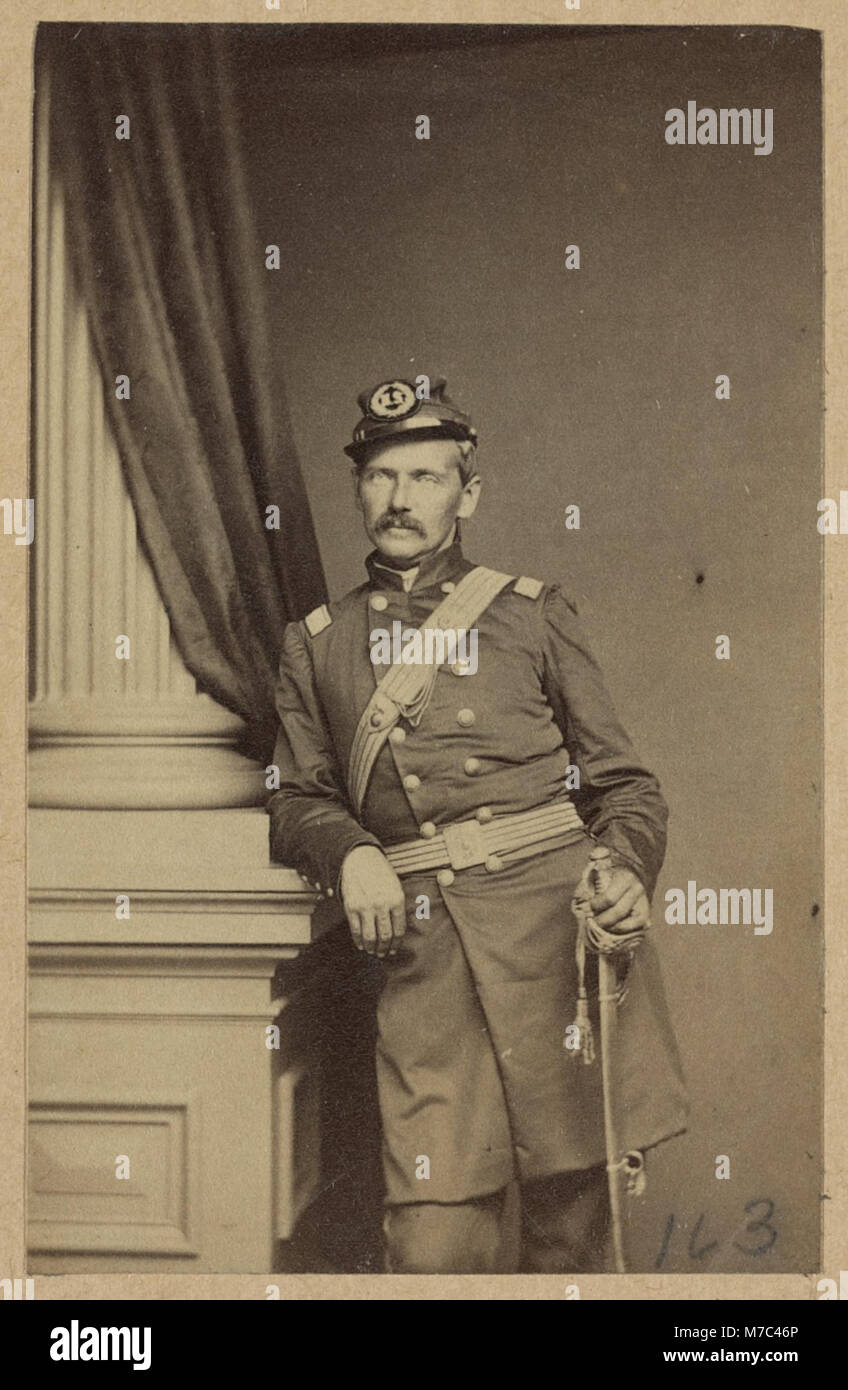 A portrait of a Union soldier holding a sword, reflecting the military ...