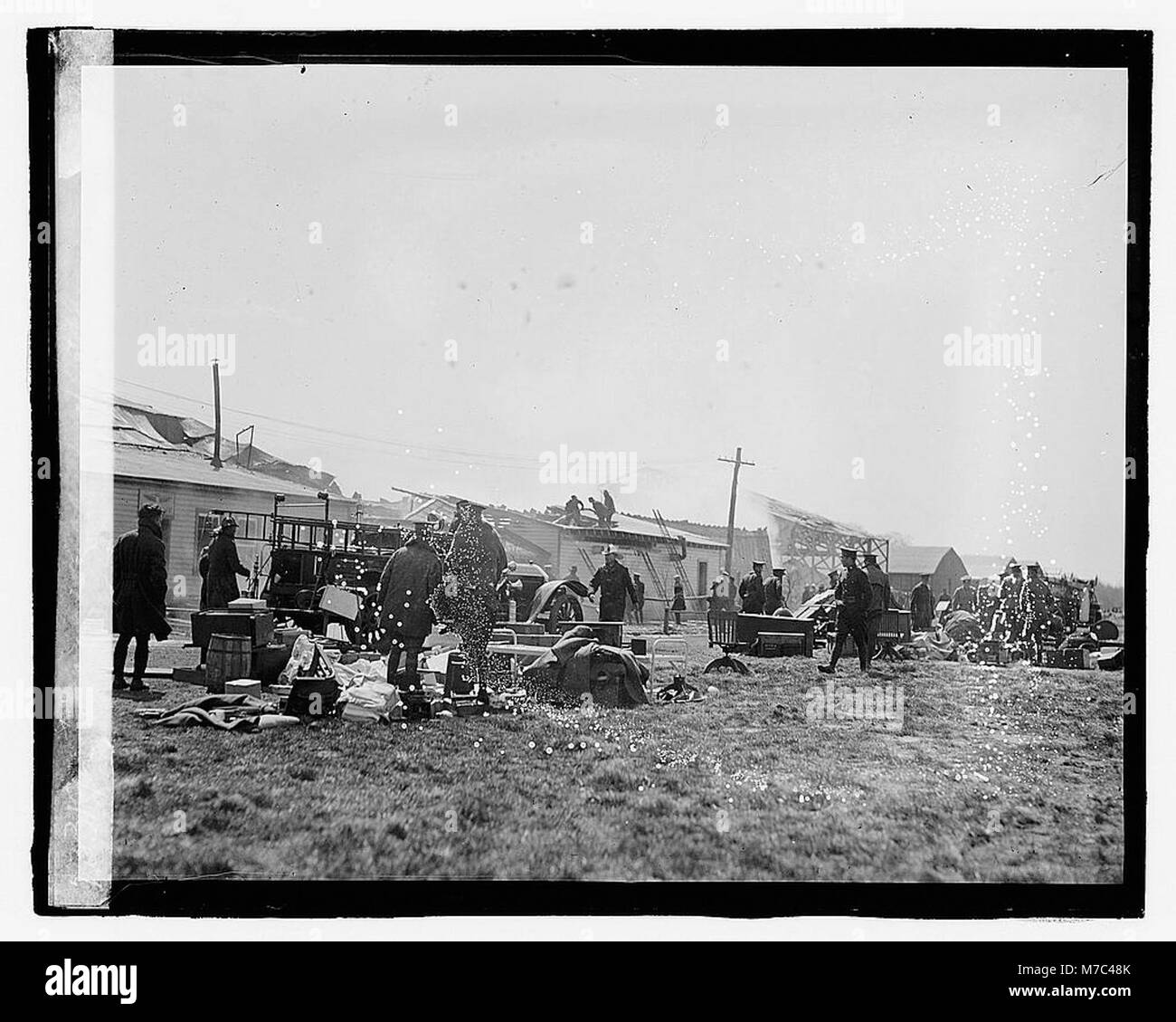 This photograph depicts a fire at Bolling Field, an airfield in ...