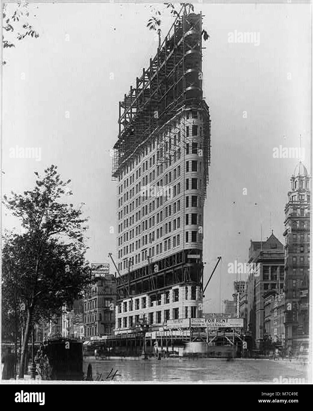 The Flatiron Building in New York City under construction, showcasing ...