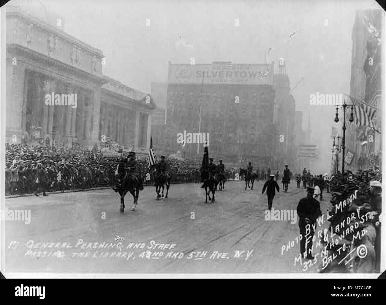 General Pershing and his staff are seen on horseback during a parade on ...