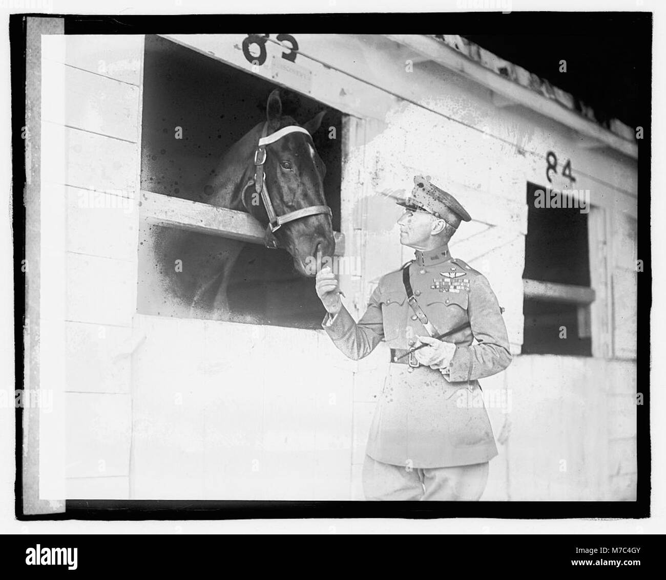 General Mitchell and the aircraft Discovery, captured in a photo dated ...