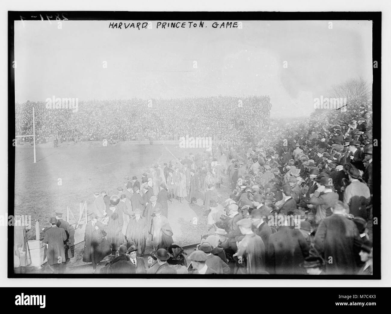This image captures the excitement of the Harvard-Princeton game, a ...