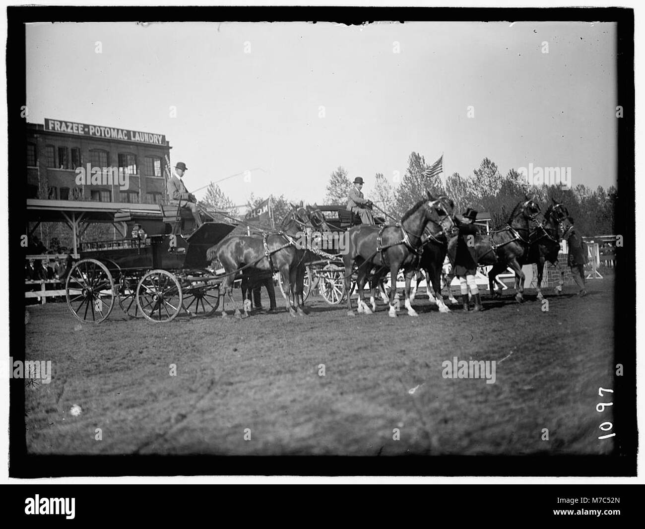 A photograph of a horse show featuring 4-horse teams, showcasing the ...