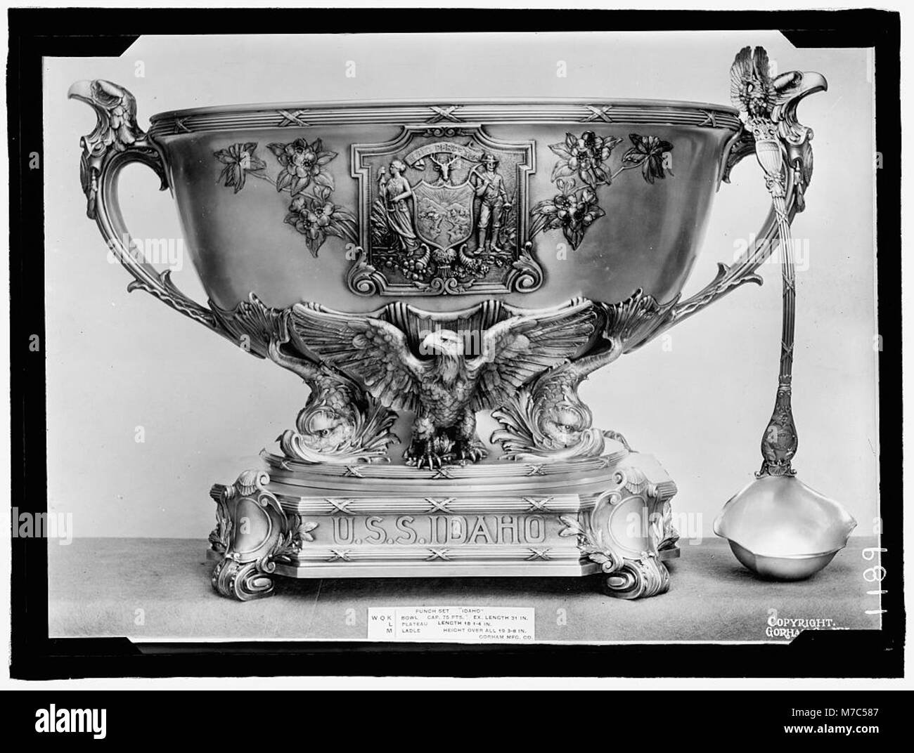 This photograph showcases the silver service of the U.S.S. Idaho, a ...