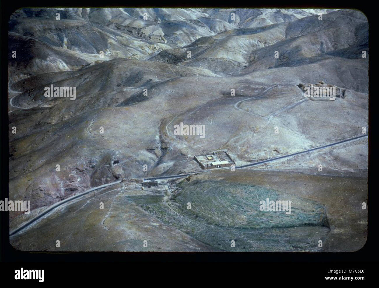 A photograph depicting the Jericho and Dead Sea area, including the ...