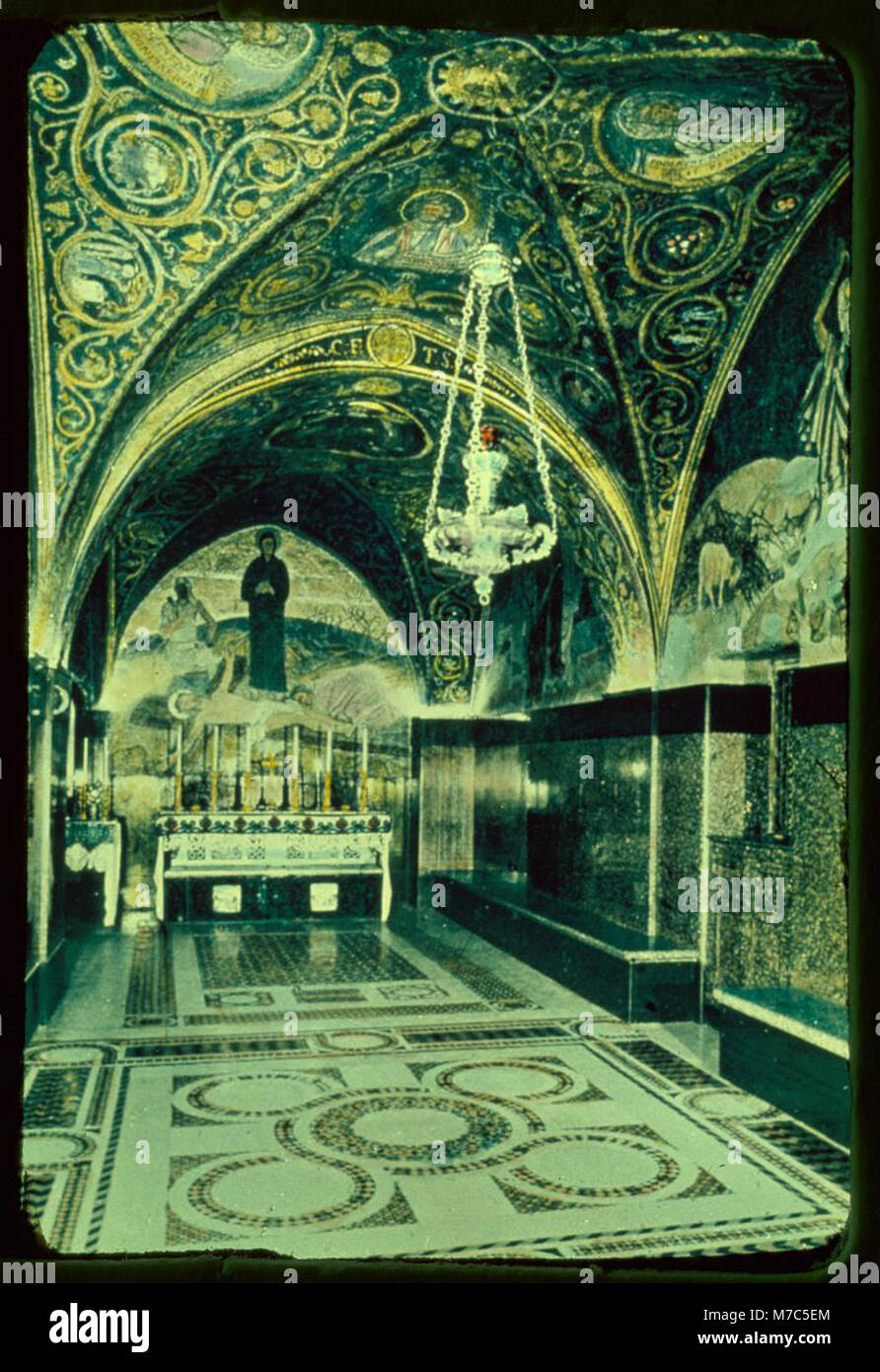 This image depicts the 11th Station of the Cross in Jerusalem, part of ...