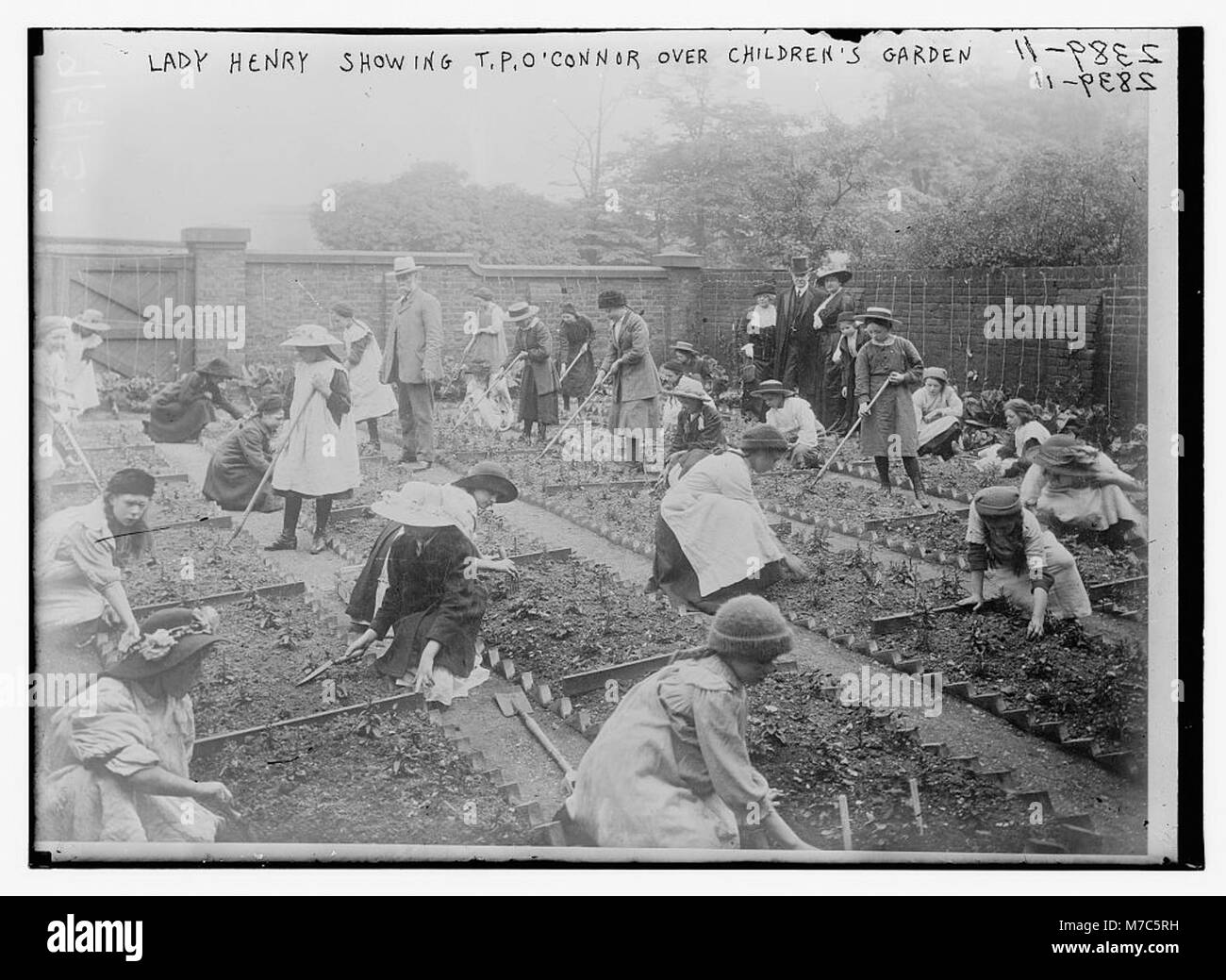 This image depicts Lady Henry showing T.P. O'Connor around a Children's ...