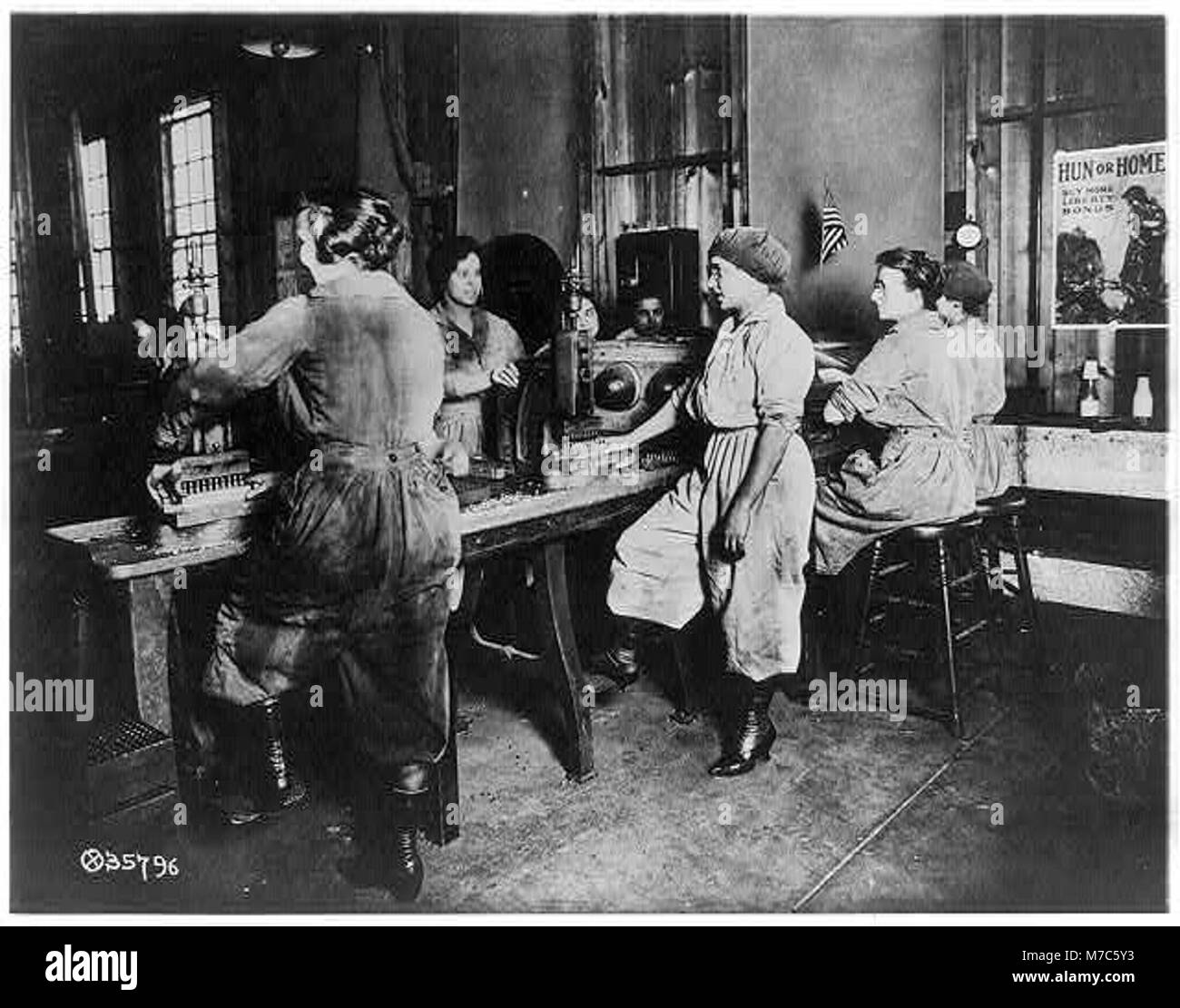 A photograph showing the loading process of incendiary bullets at the ...