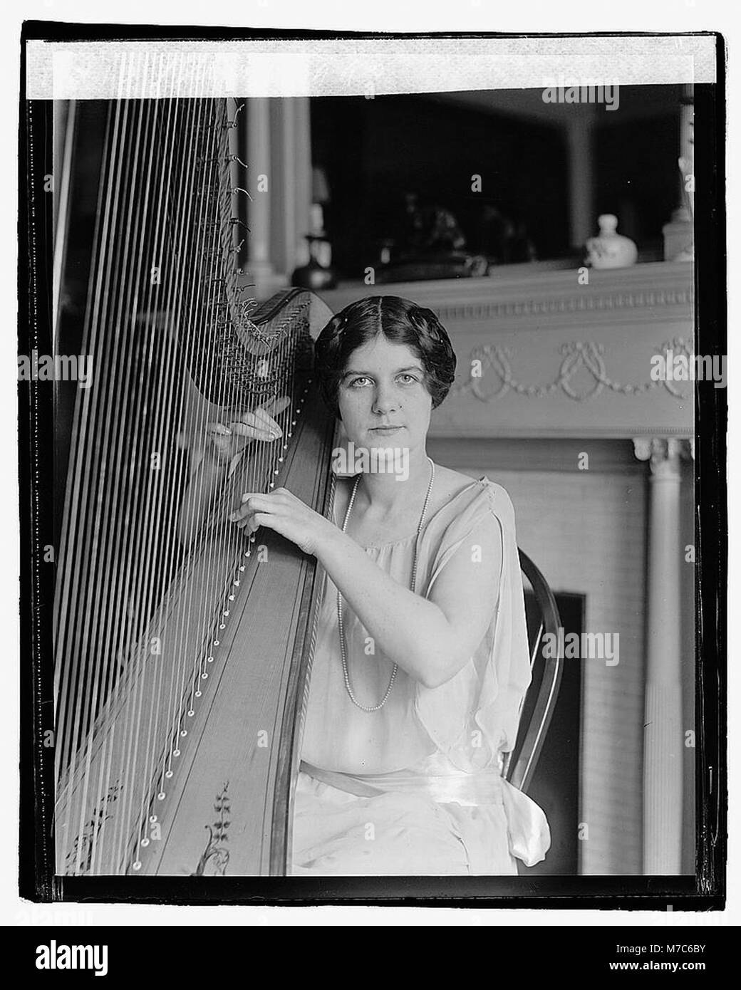 A historical portrait of Miss Riggs, capturing her role or significance ...