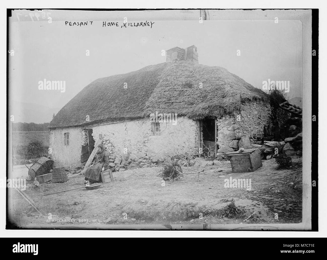 This image depicts a traditional peasant home in Killarney, Ireland ...