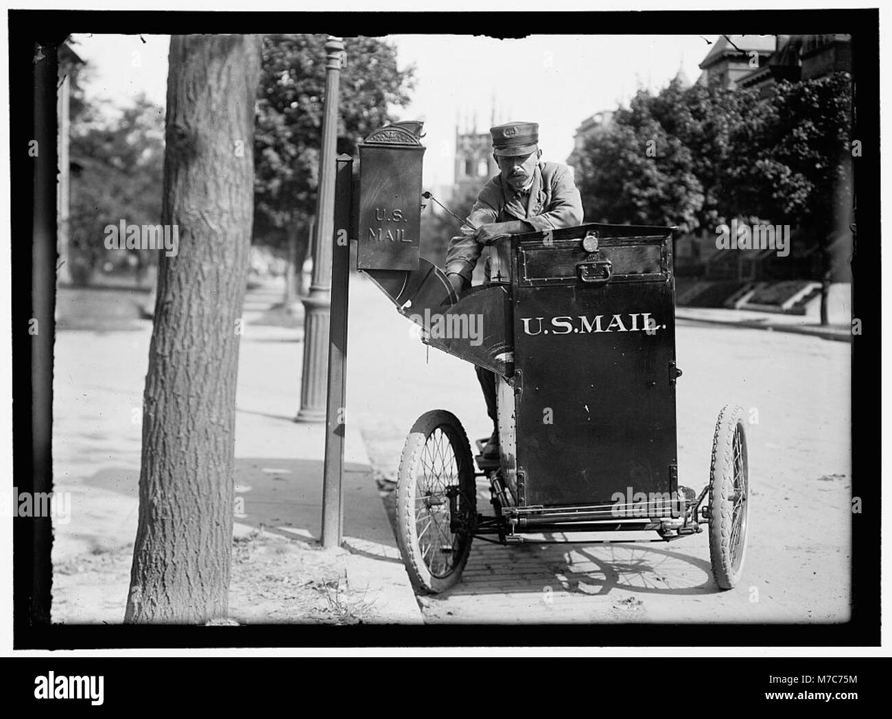An image showing a motorcycle postman from the U.S. Post Office ...