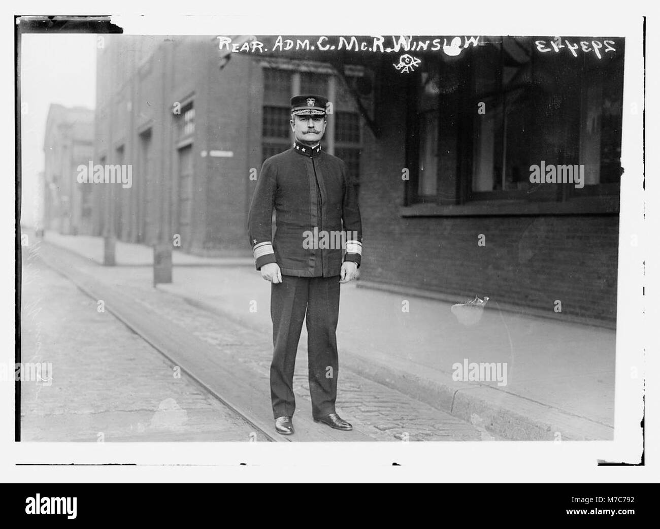 A formal portrait of Rear Admiral C. McR. Winslow, showcasing his ...