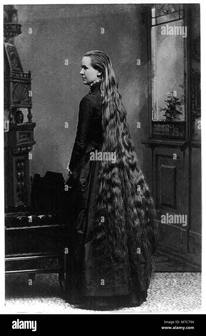This image features a rear view of a woman, possibly Martha Matilda ...