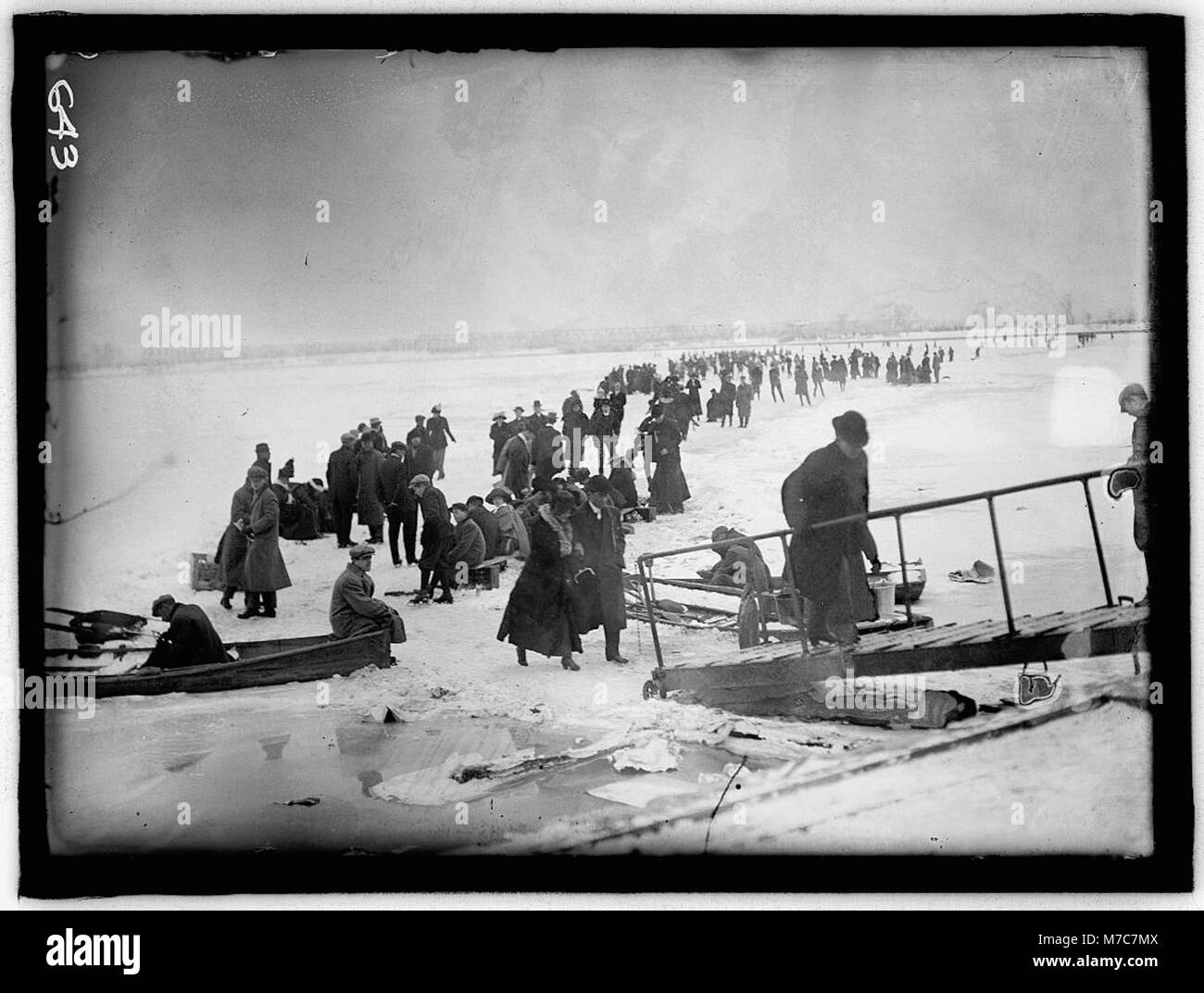 A photograph of a lively skating party, capturing people enjoying ice ...
