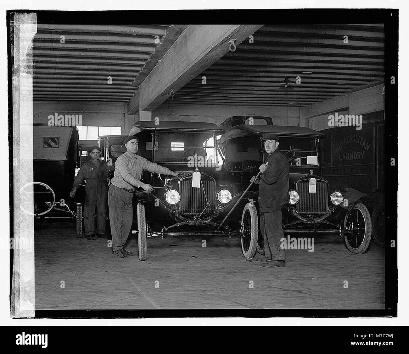 A photograph of the interior of the Taylor Motor Company, showing ...