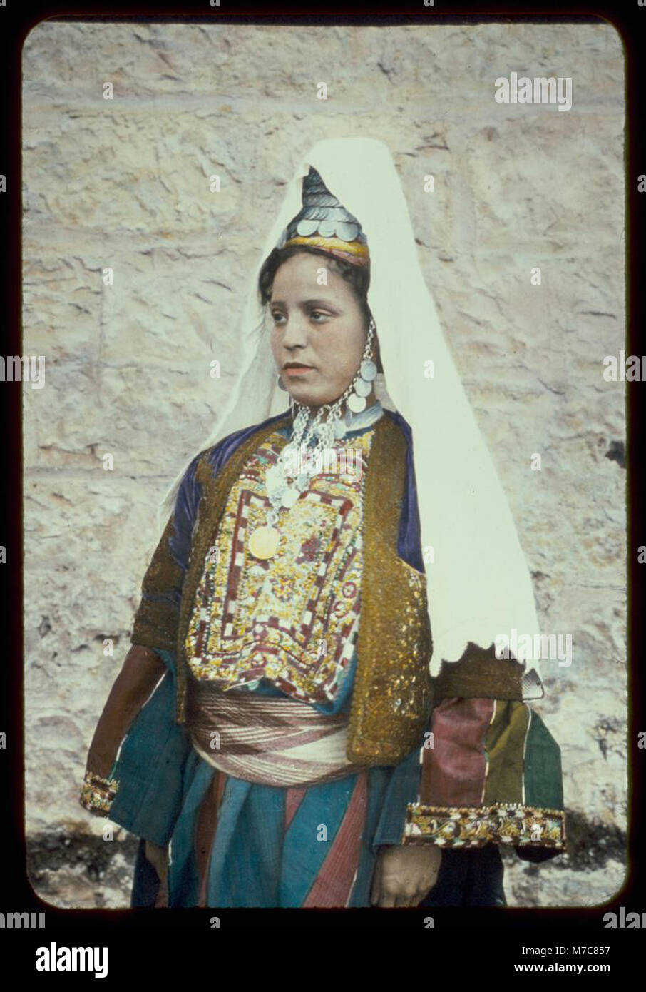 A photograph depicting a Bethlehem woman dressed in traditional attire ...