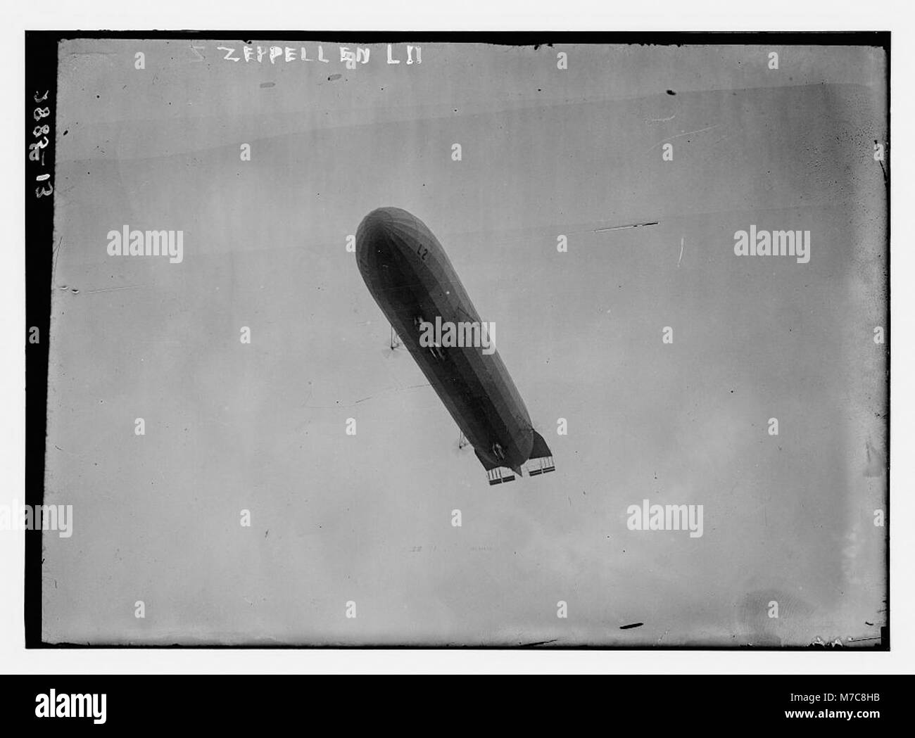 The image features a Zeppelin L II, a large German rigid airship used ...