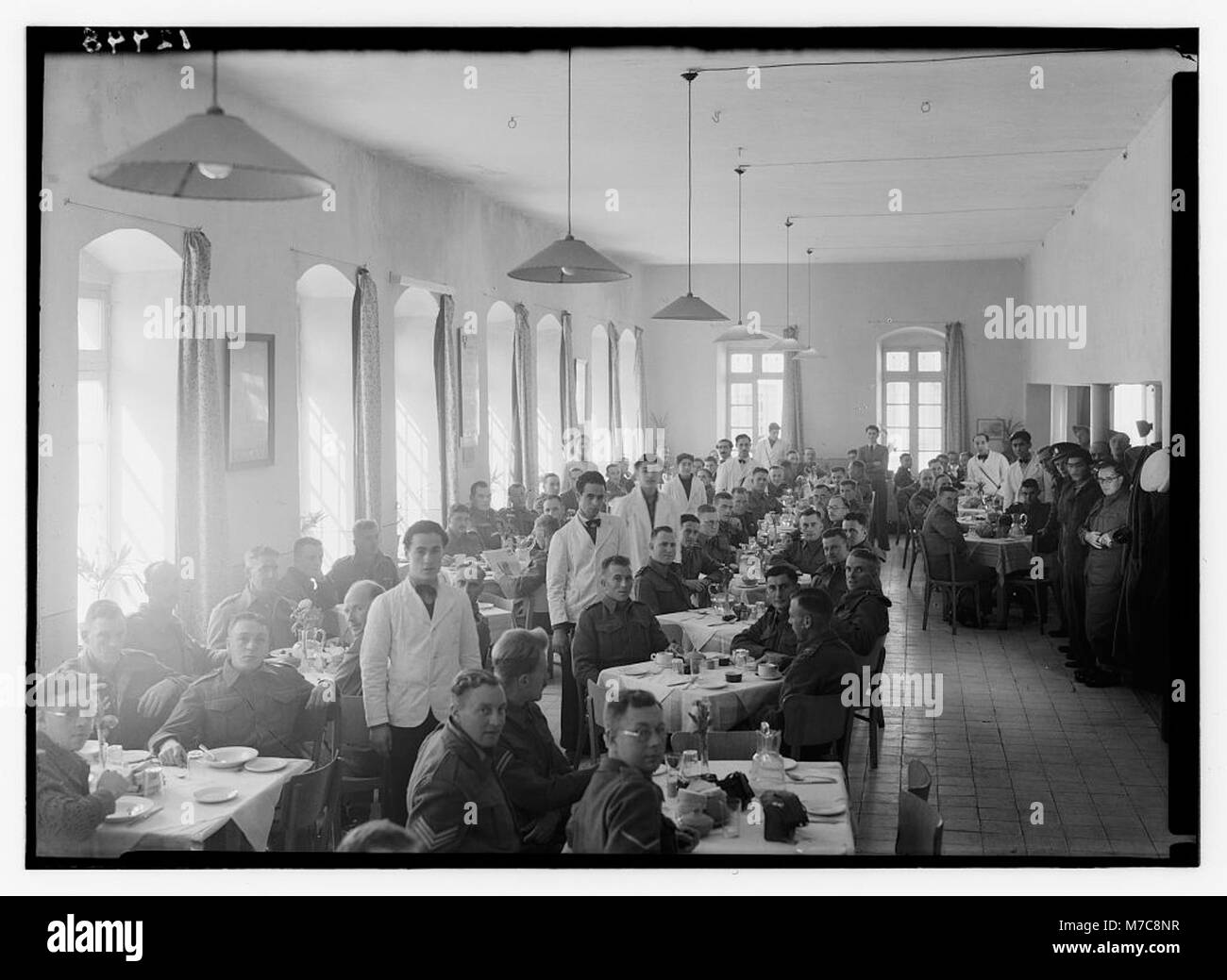 An image of the dining hall at a 'Y' hostel, likely located in an old ...