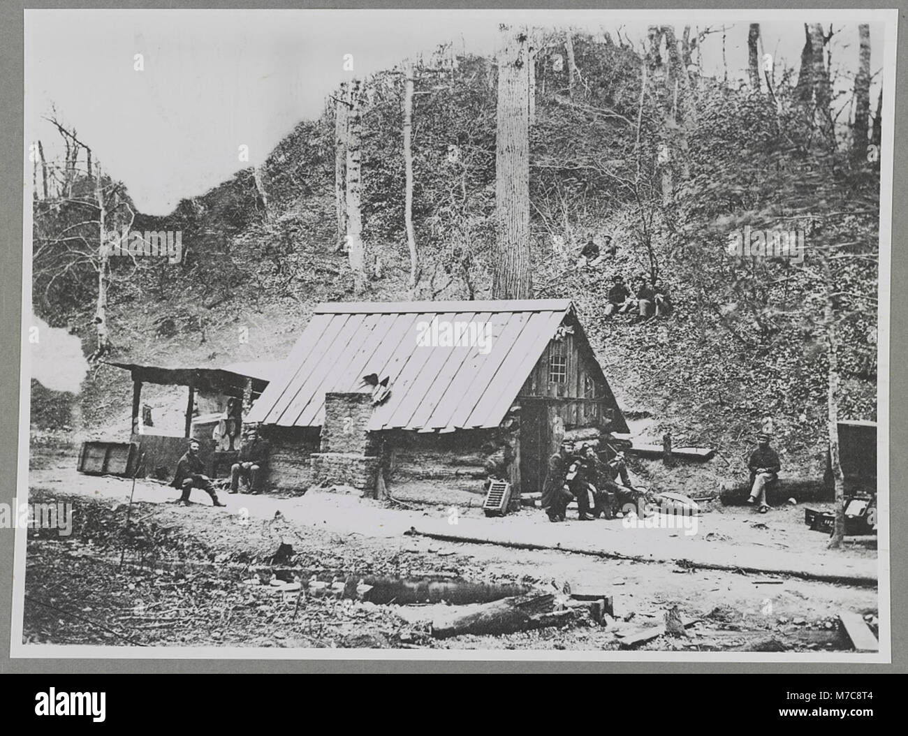 The image represents a military camp, likely from a historical conflict ...