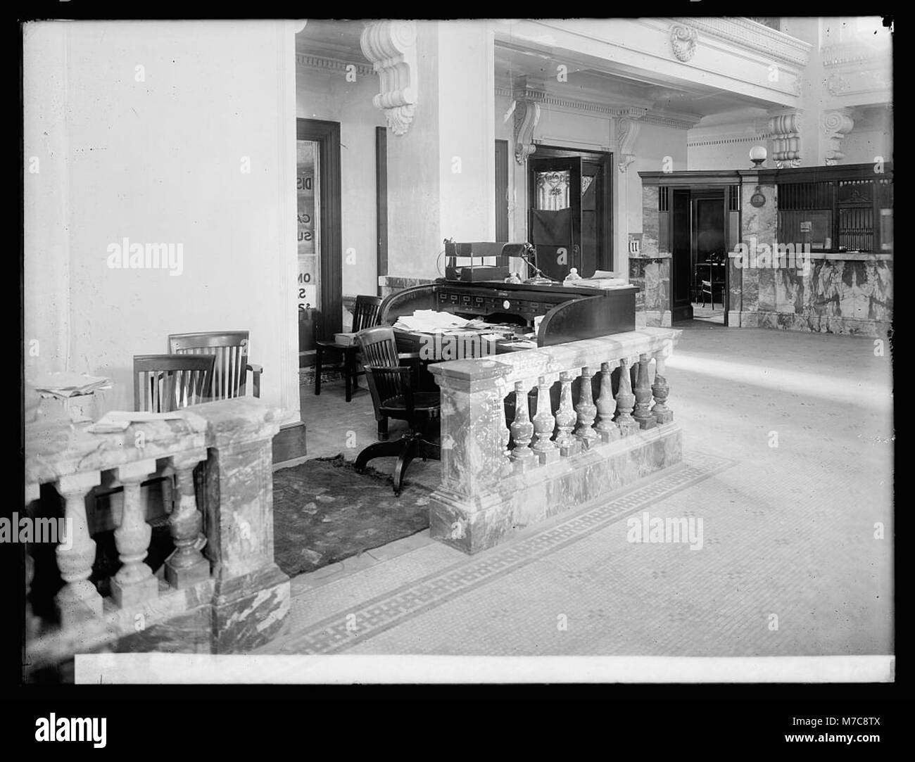 The interior of the District National Bank, showcasing the architecture ...