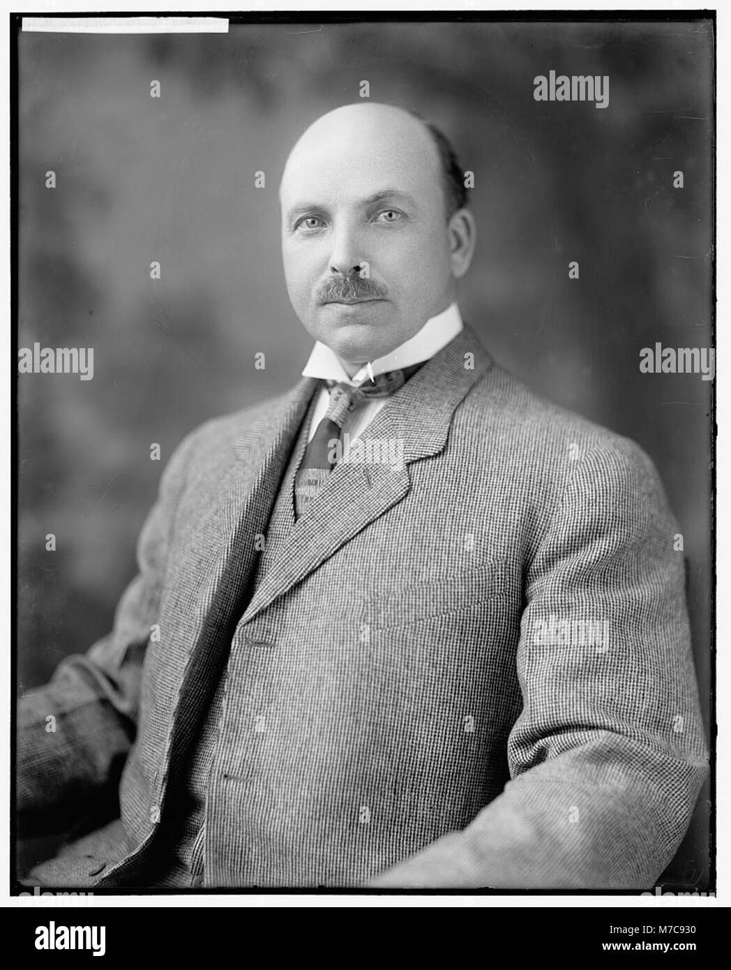 A formal portrait of the Honorable M. Donahoe, a notable public figure ...