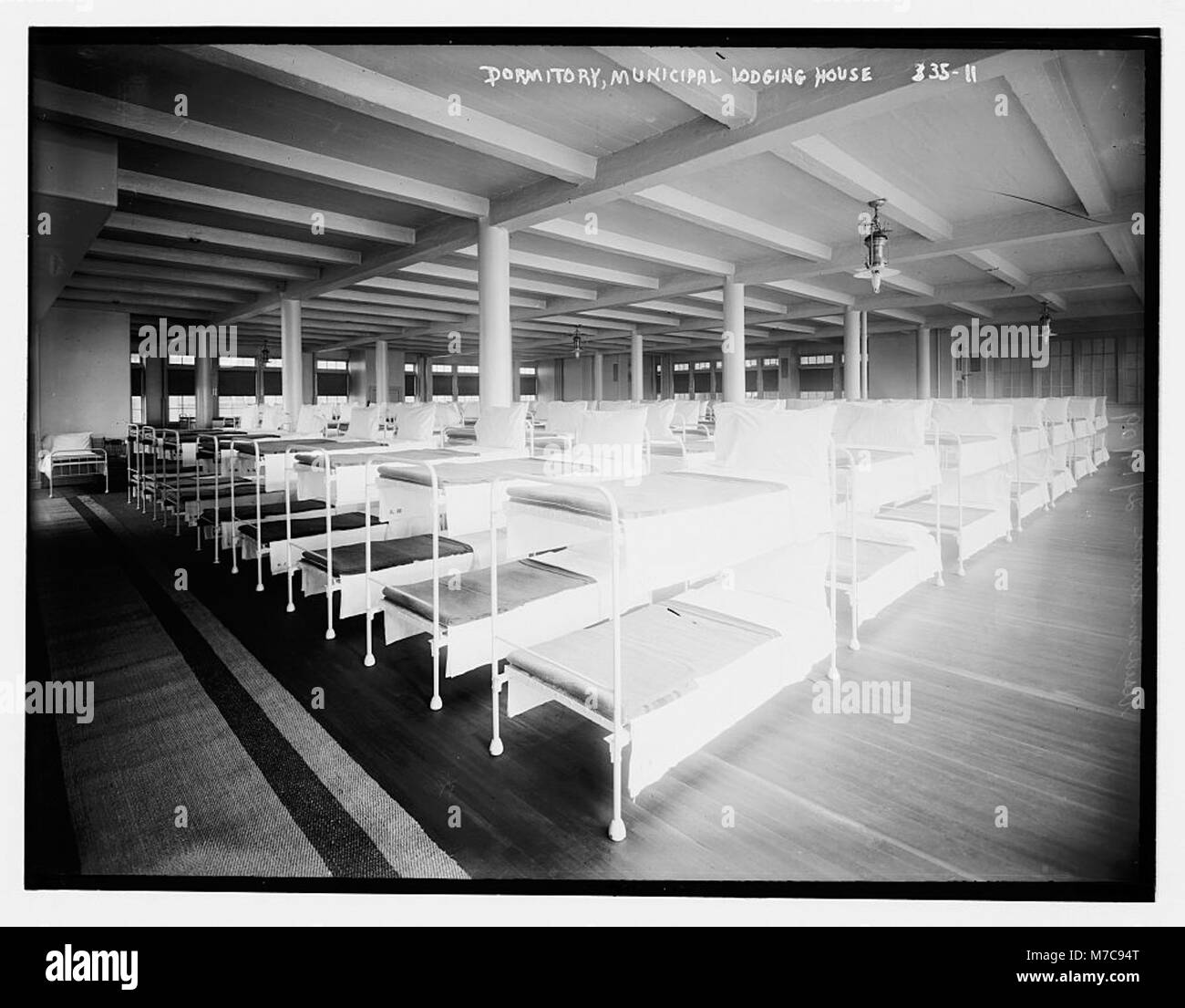 A historical photograph of a municipal lodging house dormitory ...