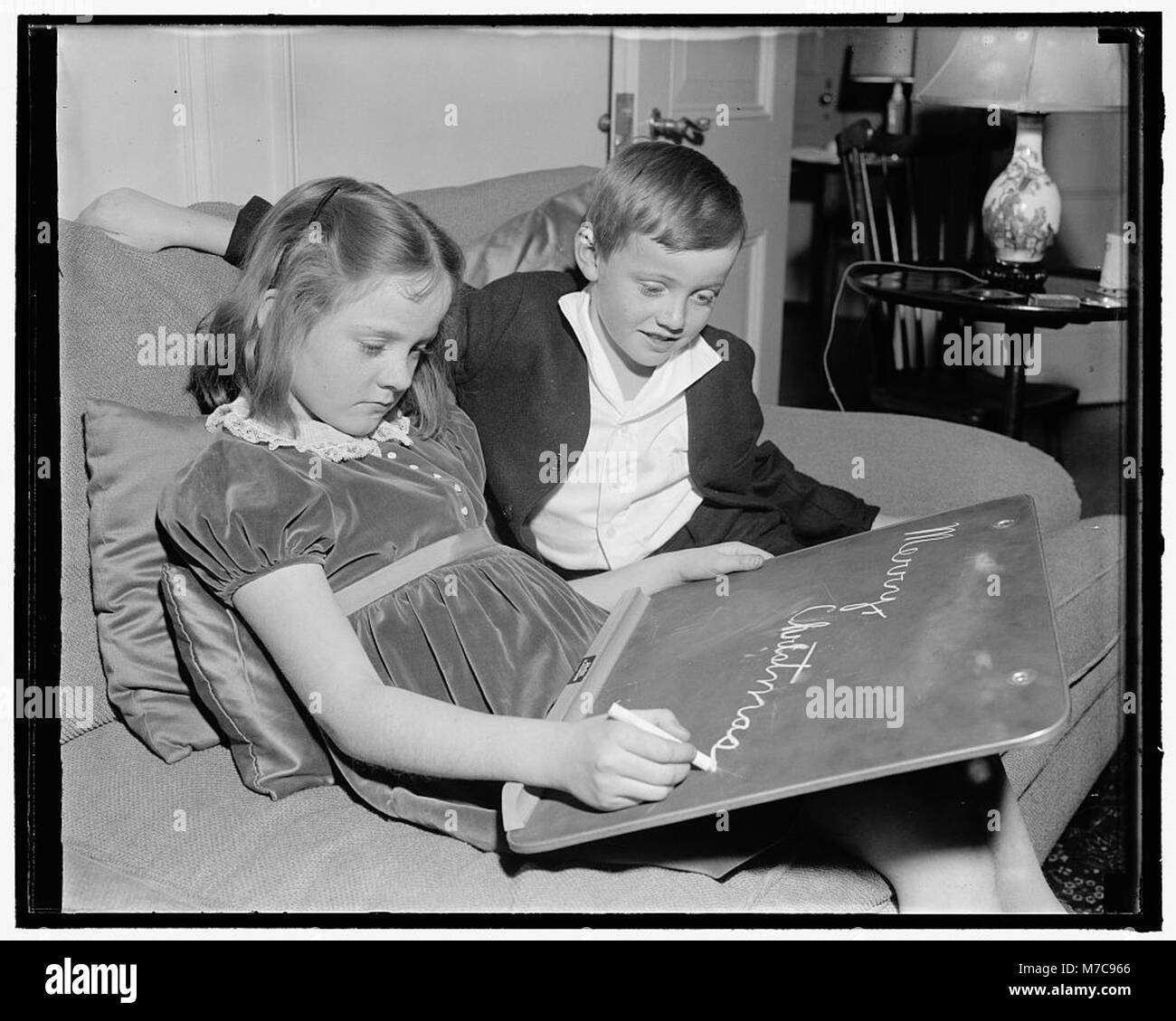 A photograph of the Douglas children, capturing their likeness in a ...